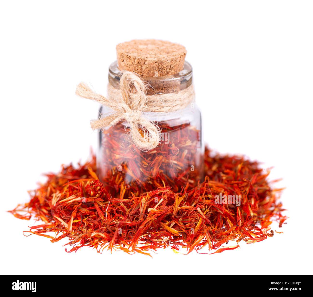 Pile of Imeretian Saffron in glass jar, isolated on white background ...