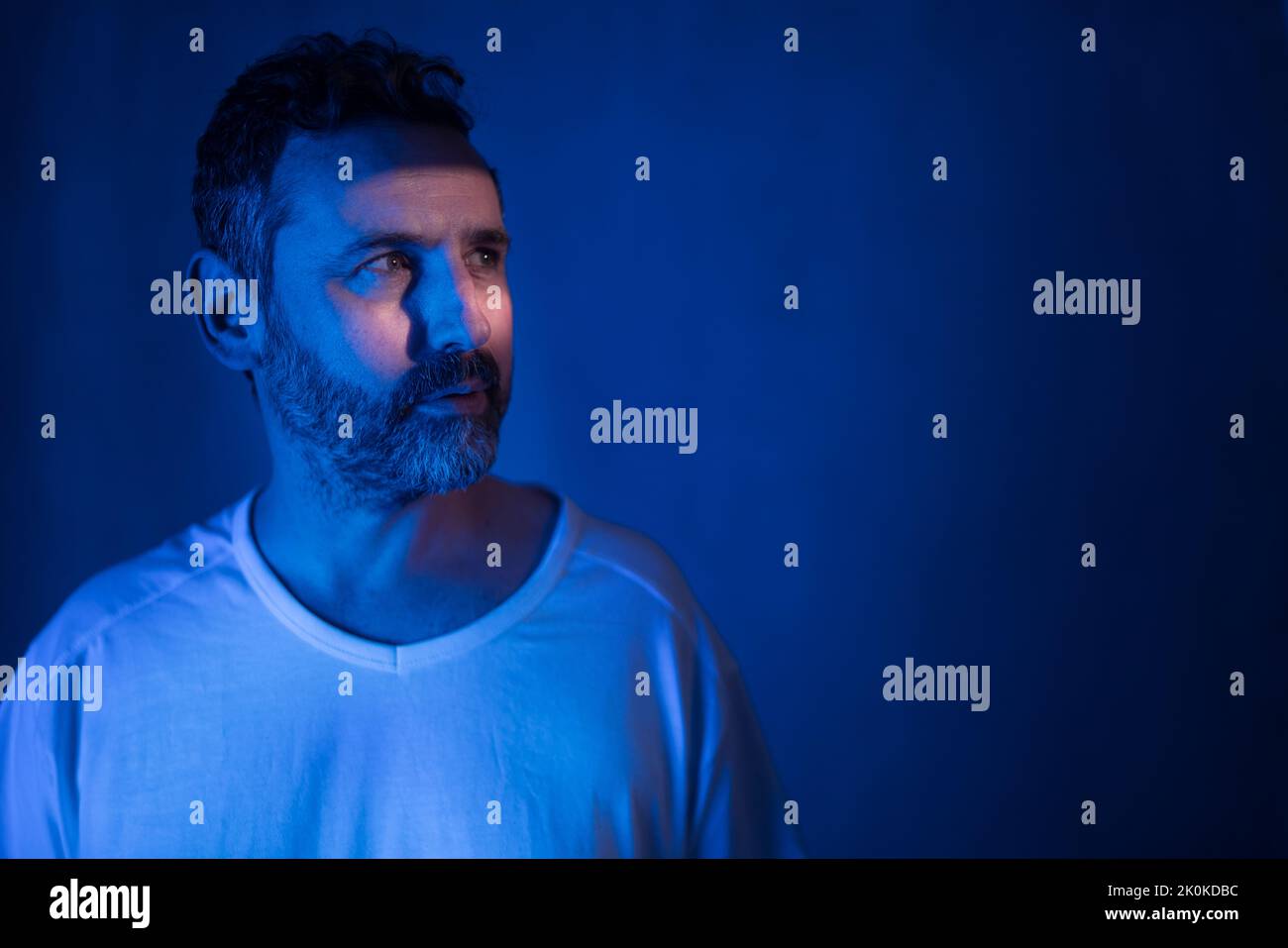 Depressed mature man, alone in darkness, mental health concept Stock ...
