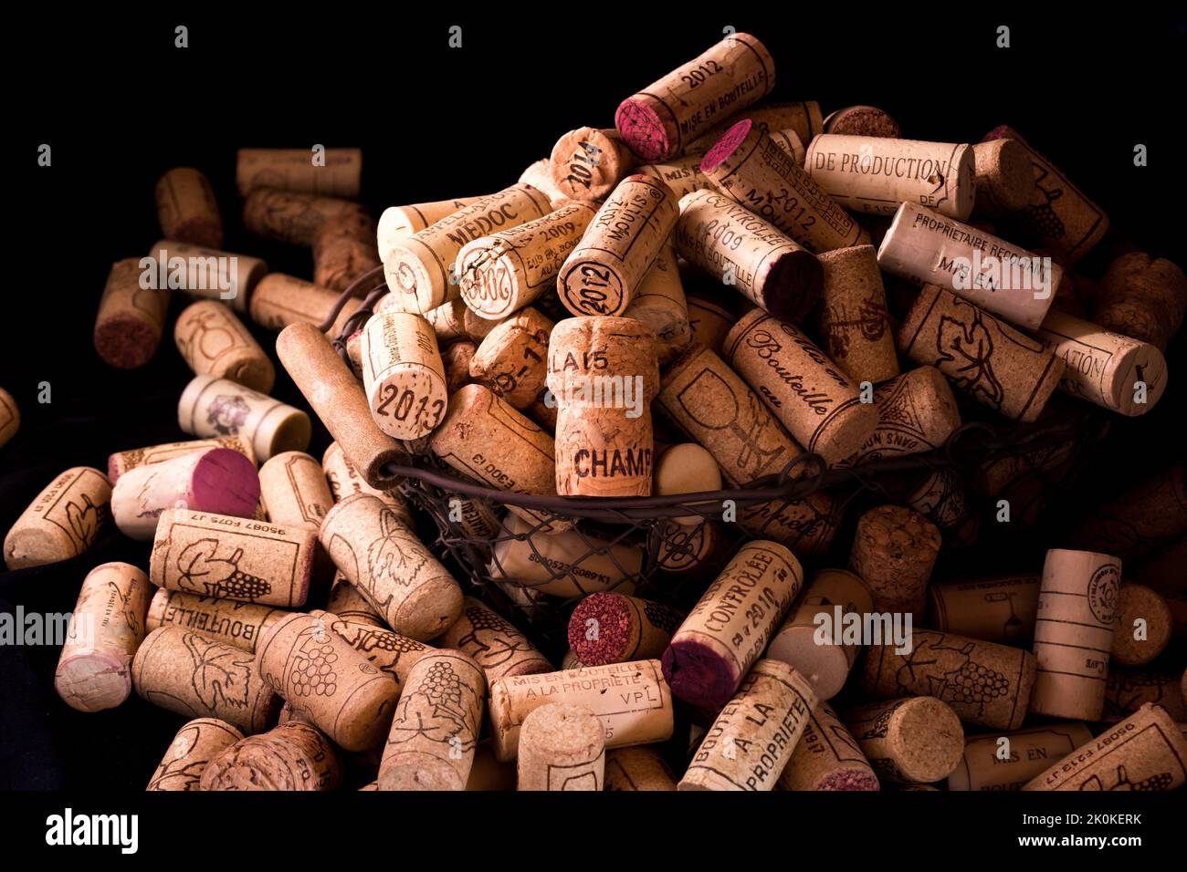 old cork stoppers of French wines in a wire basket Stock Photo - Alamy