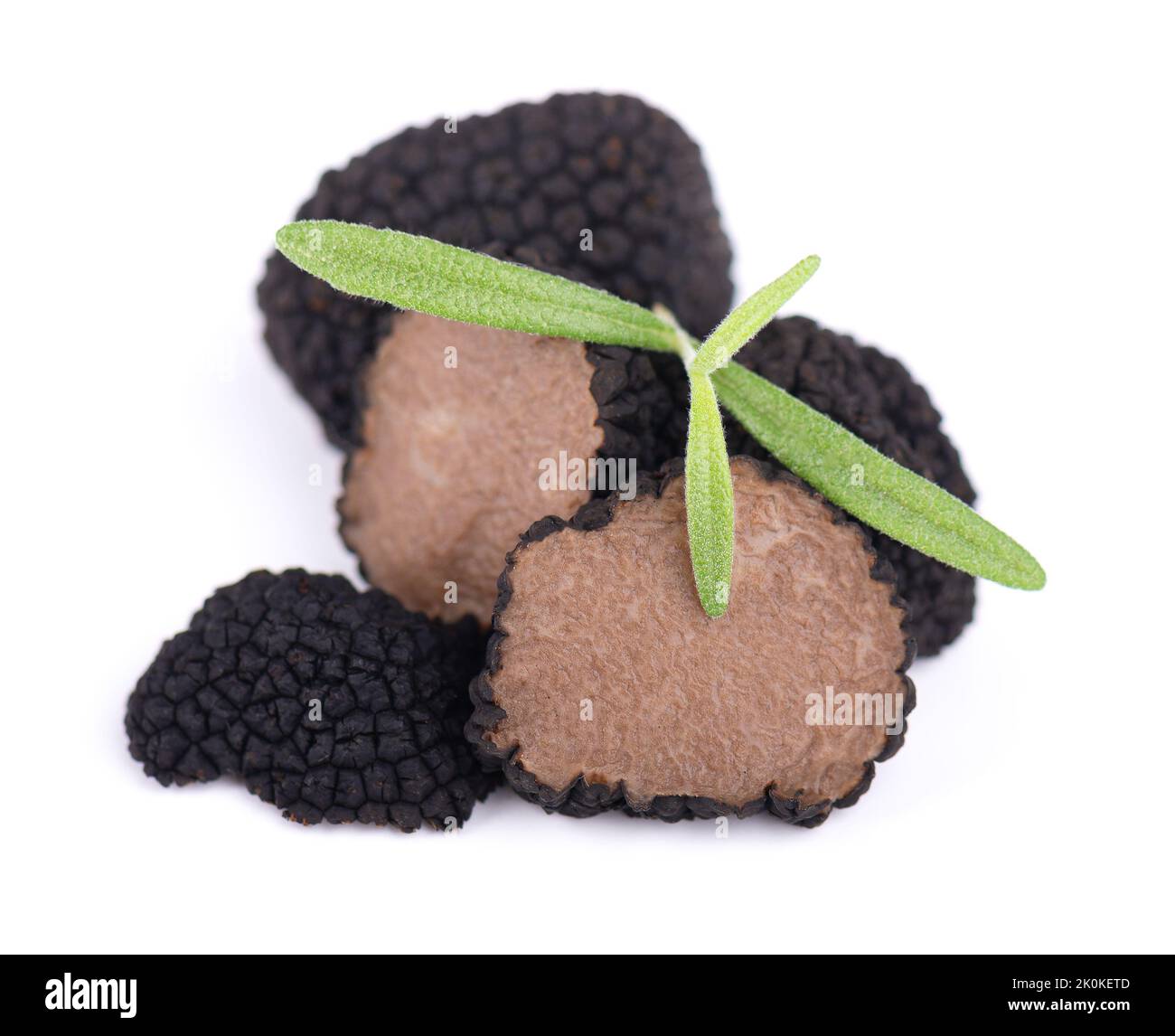 Black truffles isolated on a white background. Fresh sliced truffle ...