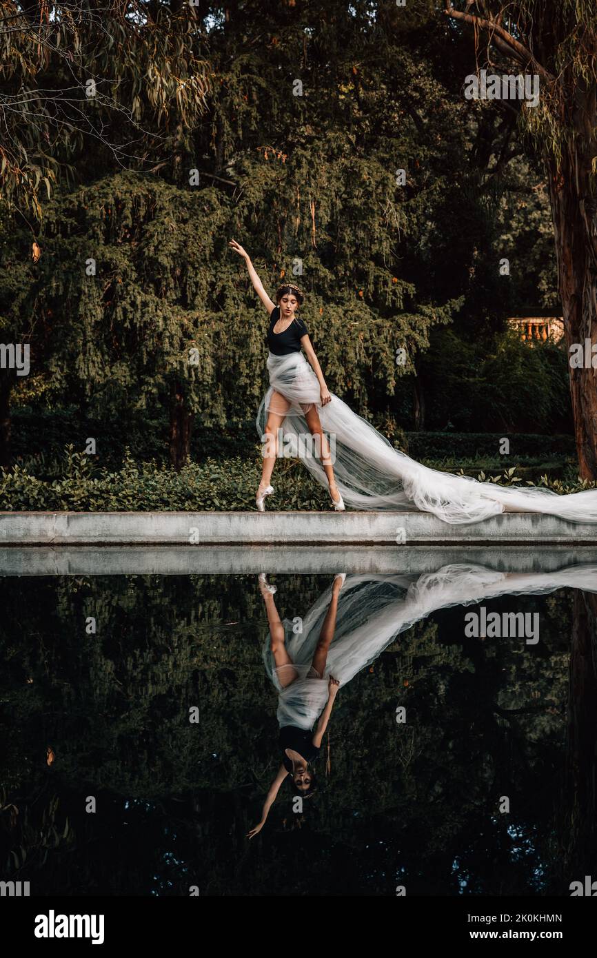 Young professional dancer posing by the water Stock Photo - Alamy