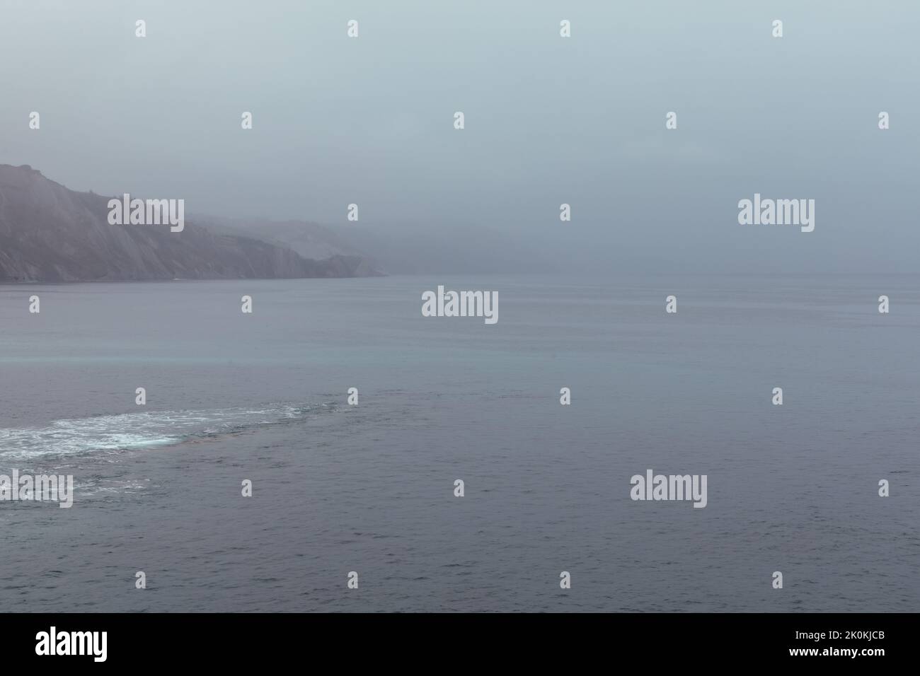 Coastal landscape with fog Stock Photo - Alamy