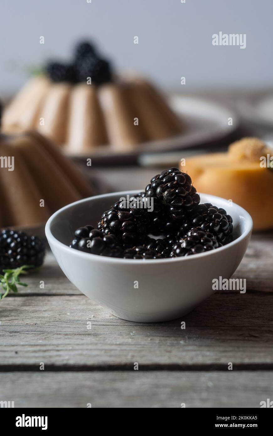 Closeup of served vegan panna cotta with peach and shiny sweet ...