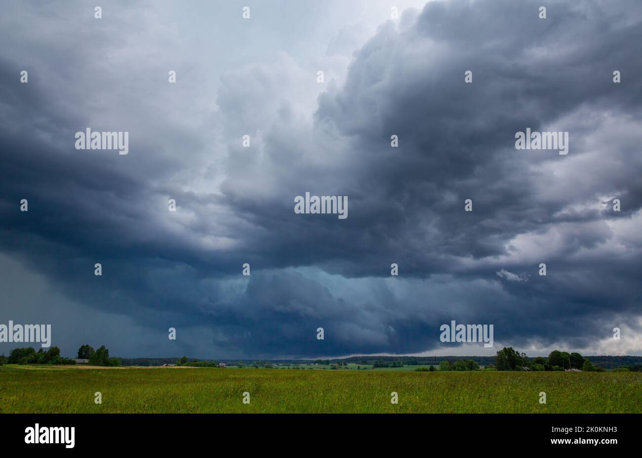 Storm clouds over field, tornadic supercell, extreme weather, dangerous ...