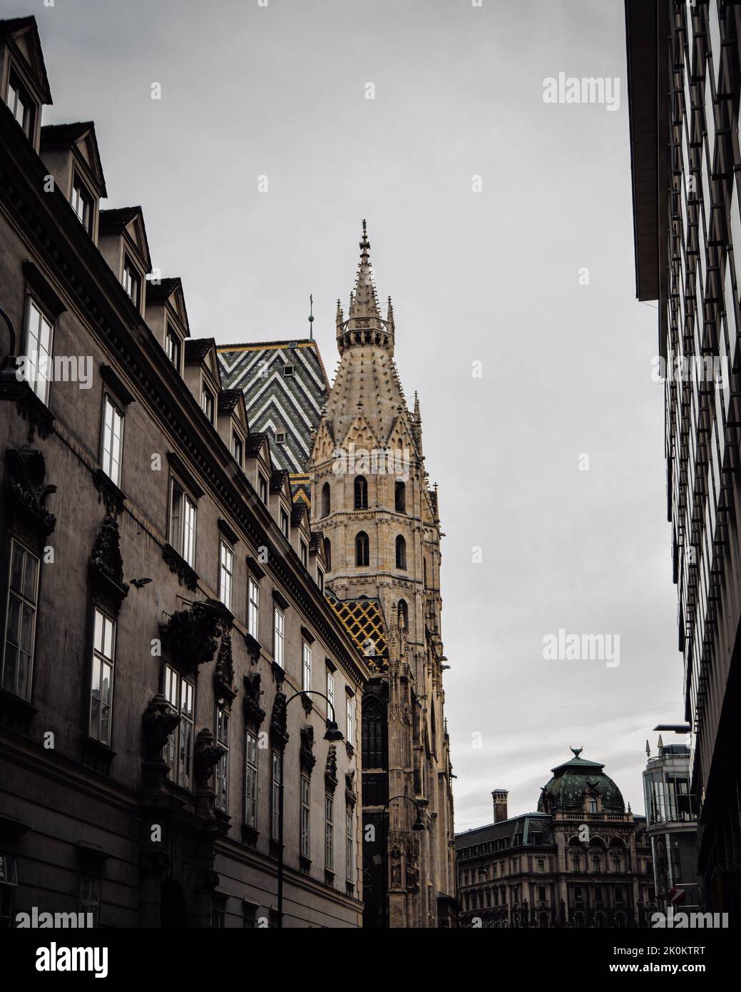 A low-angle view of a modern building on a cloudy day Stock Photo - Alamy