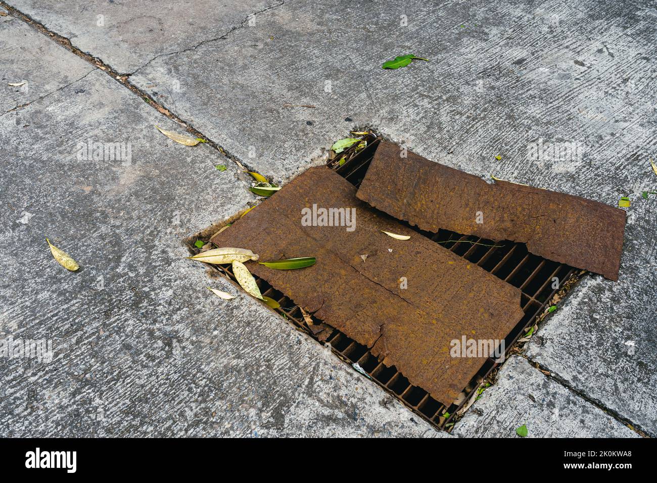 Top view of old rusted metal plate was used to cover the broken steel ...