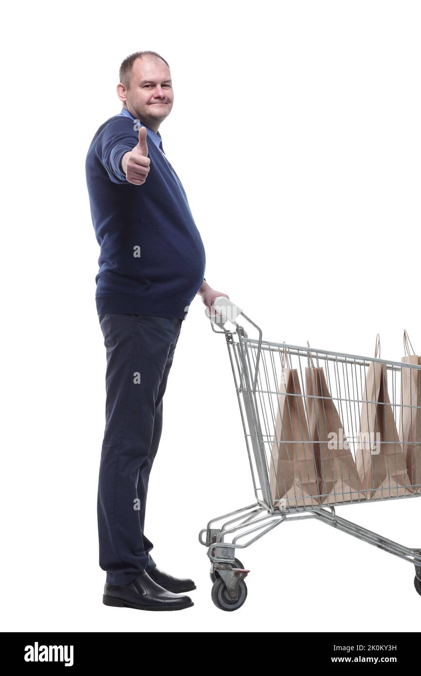 in full growth. casual mature man with shopping cart Stock Photo - Alamy