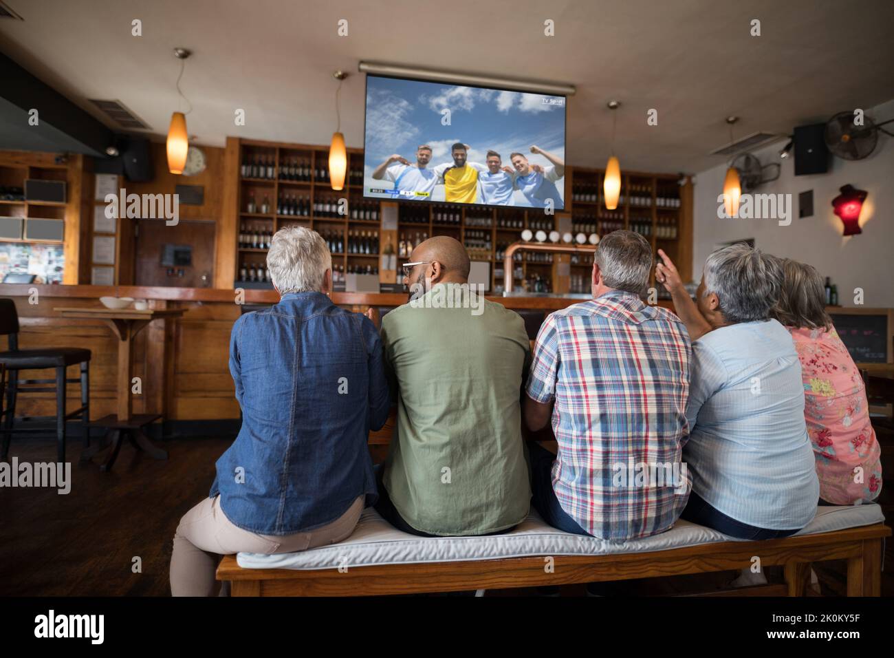 Group of friends soccer game stadium hi-res stock photography and ...