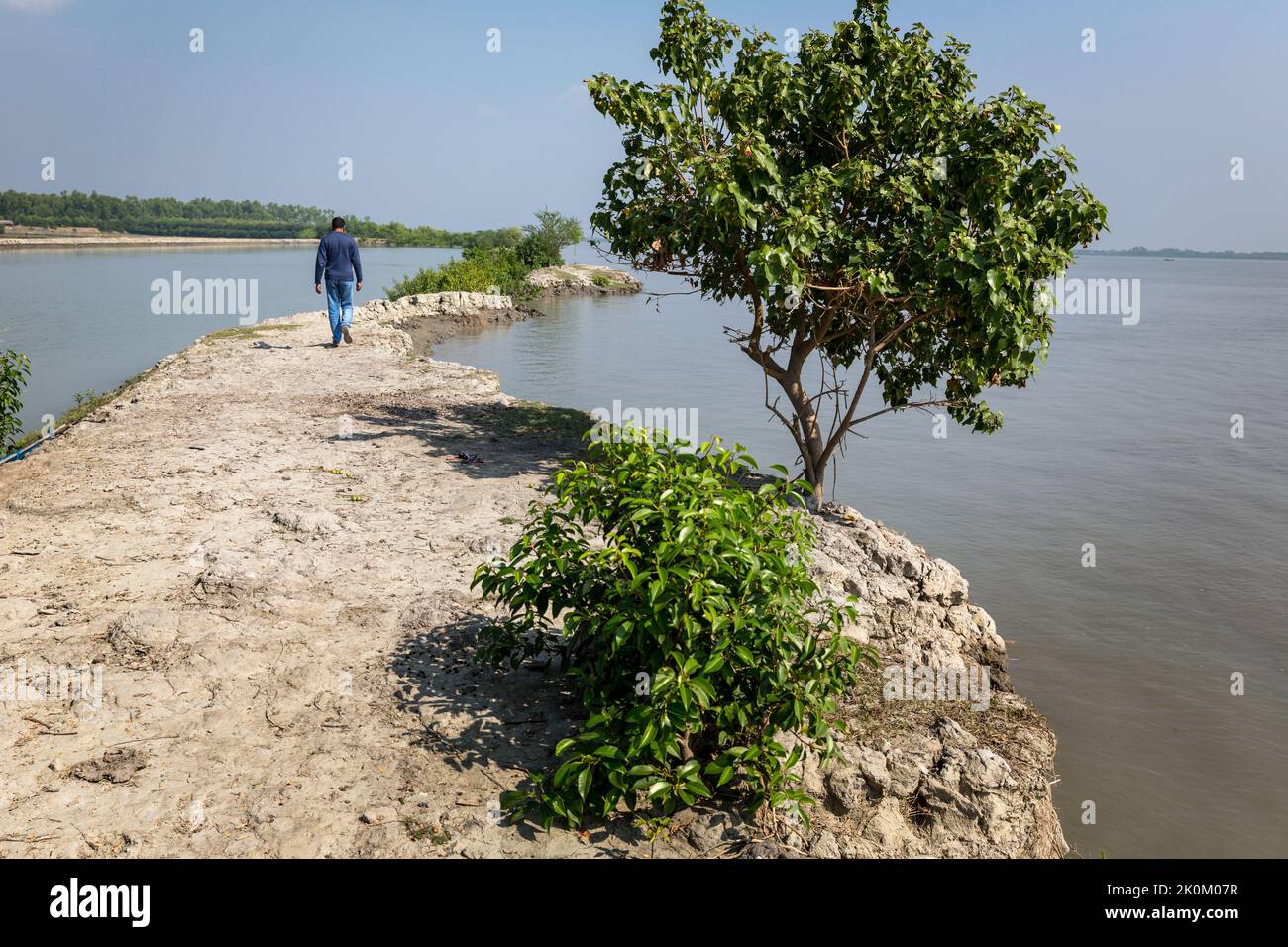 Dikes damaged by the rise in sea level near Shyamnagar. The people in ...