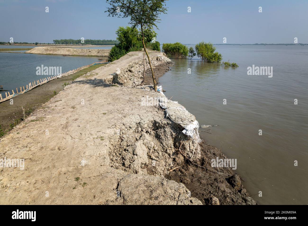 Dikes damaged by the rise in sea level near Shyamnagar. The people in ...
