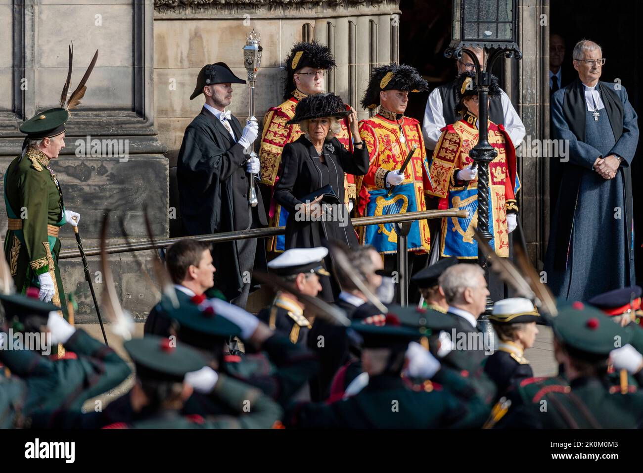 The Queen Consort watches as Queen Elizabeth II's coffin arrives at St ...