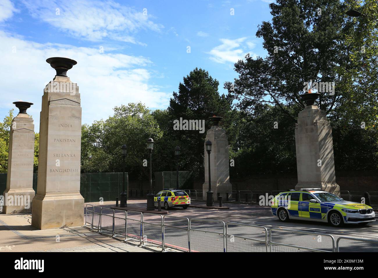 The plinths at the Commonwealth Memorial Gates are lit in tribute to ...