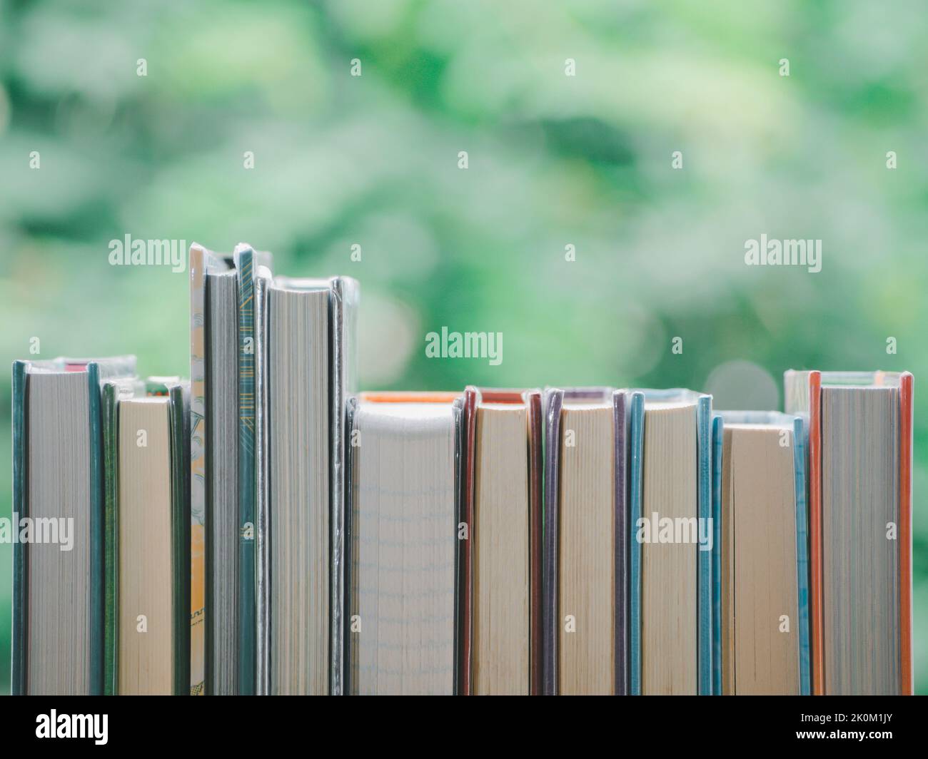 A simple composition of many books, stack or pile of books on wooden ...