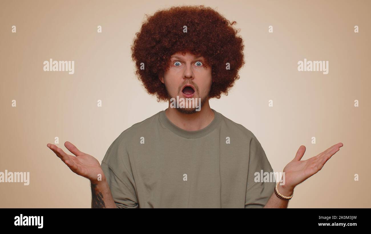 Oh my God, Wow. Excited amazed winner man raising hands in surprise ...