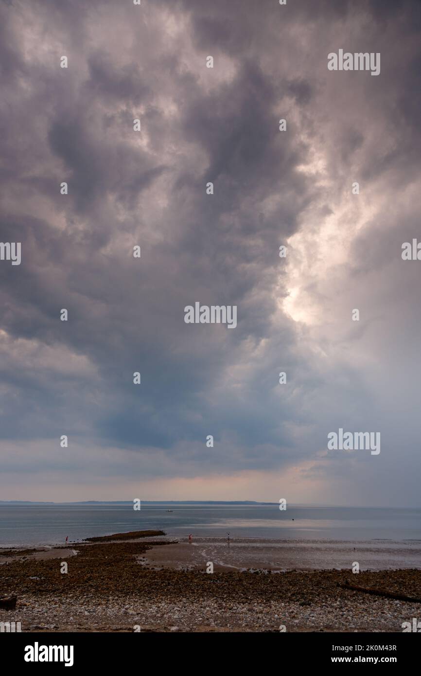 Storm clouds and rain over the West Shore at Llandudno on the North ...