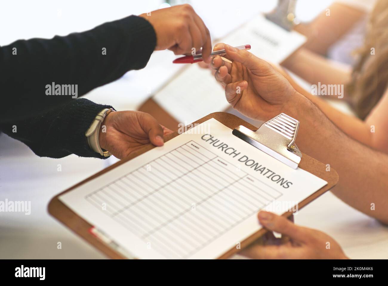 Giving back is so rewarding. volunteer getting signatures for church ...