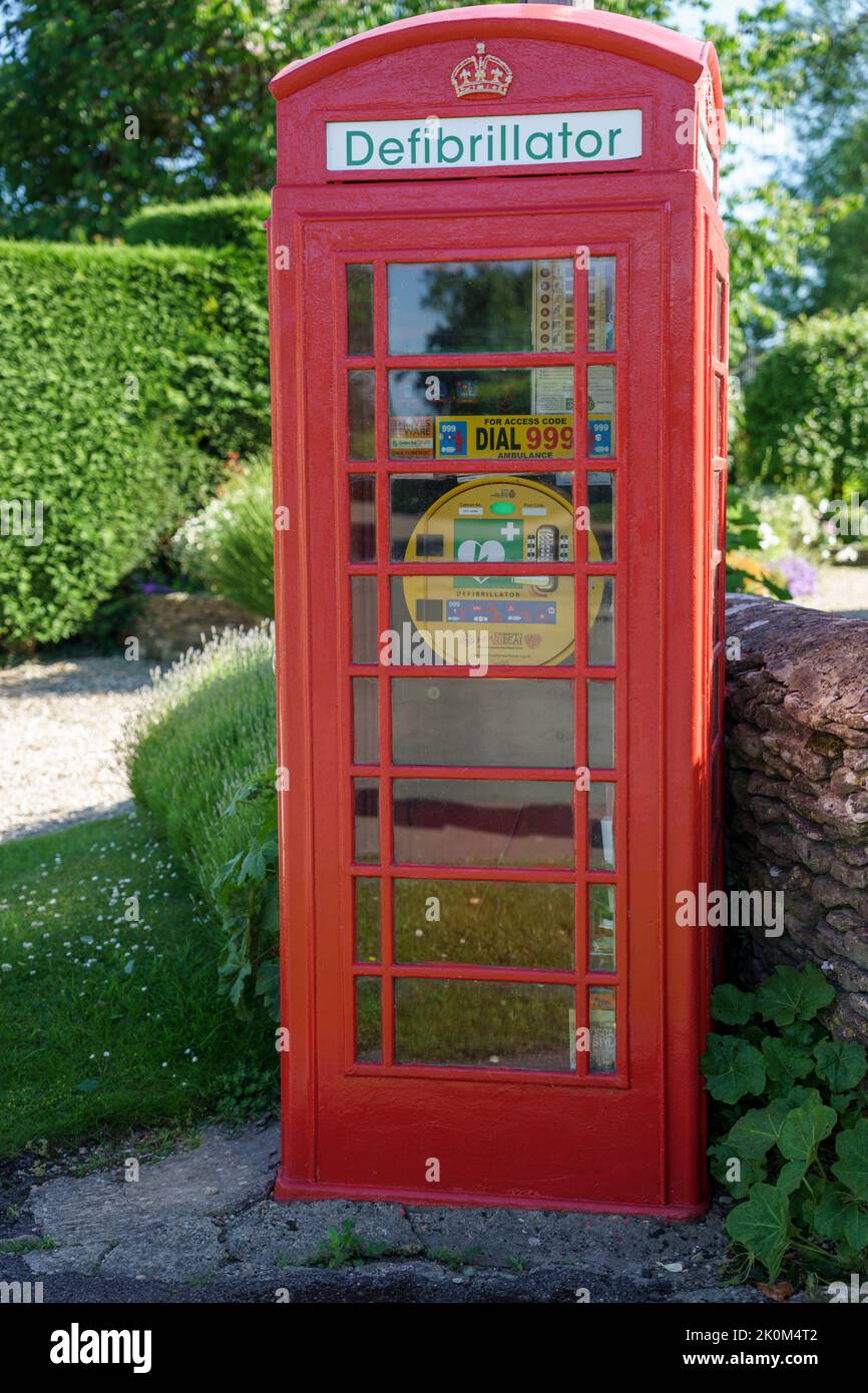 An old red public box telephone in the village of Poole Keynes in ...