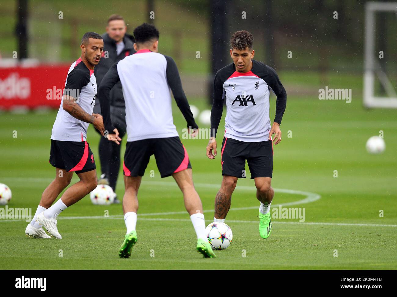 Liverpool's Roberto Firmino (right) during a training session at the ...