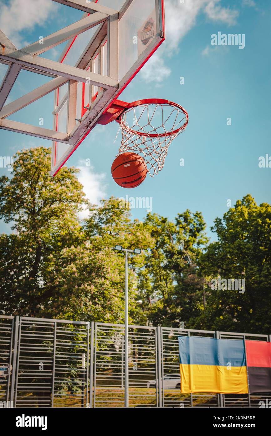 basketball rim with ball in net Stock Photo - Alamy