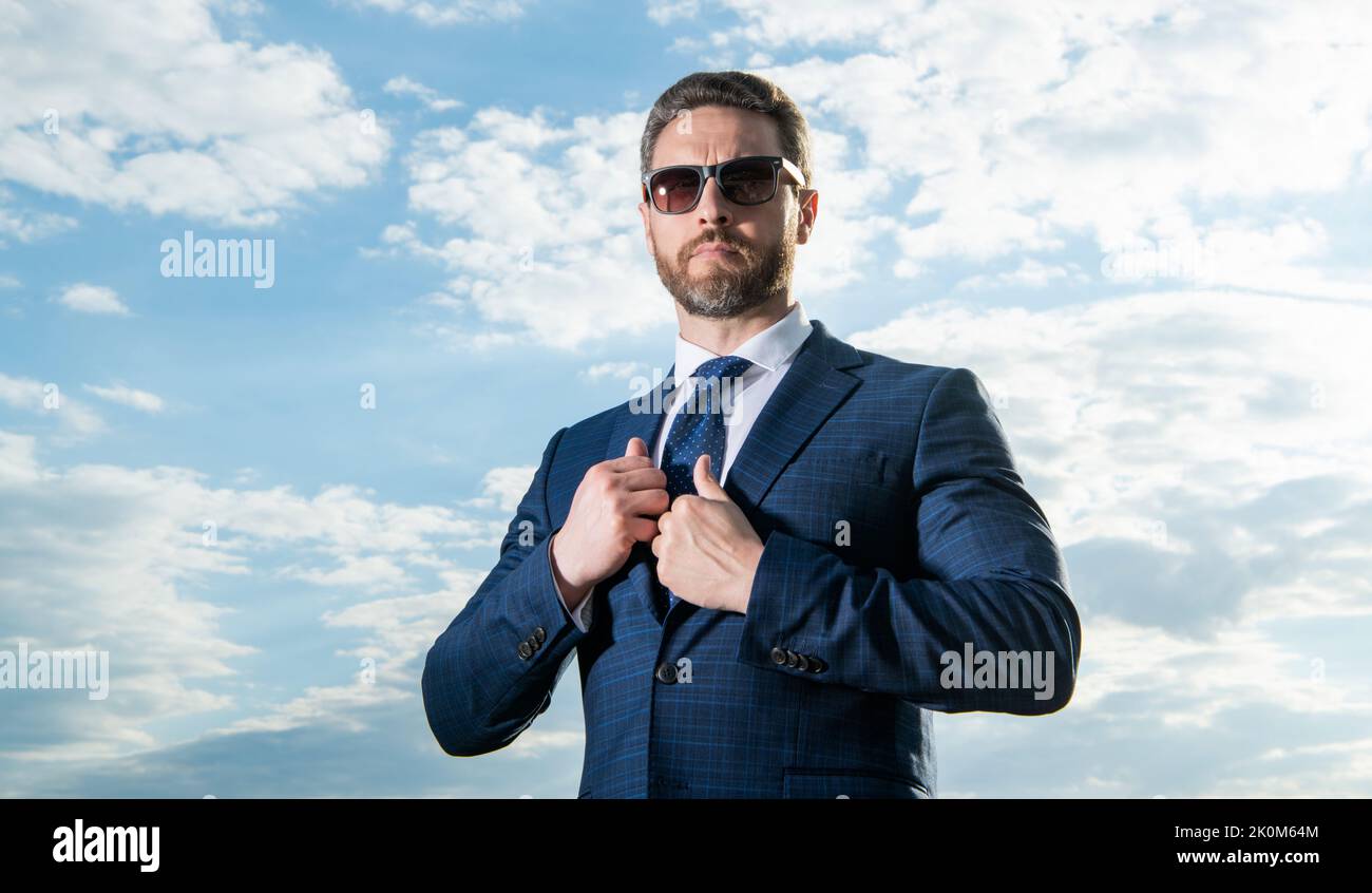 Professional man sky background. Unshaven man in suit. Serious man ...
