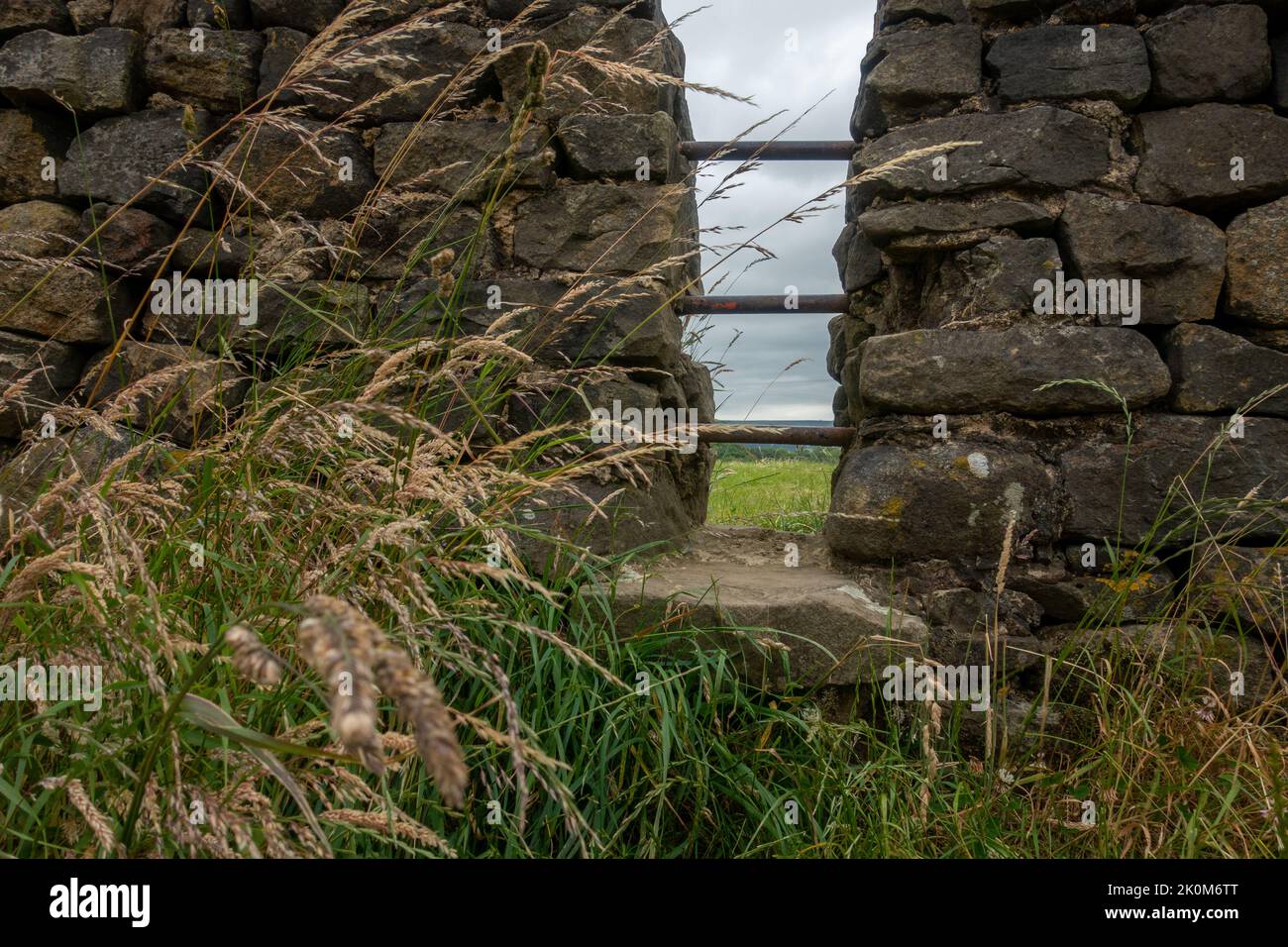 Squeeze stile, or squeezer stile, in a dry stone wall made harder to ...