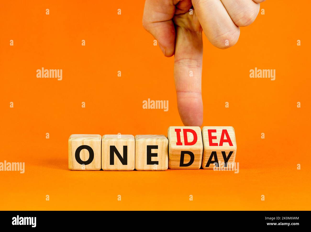 One day and idea symbol. Concept words One day and One idea on wooden ...