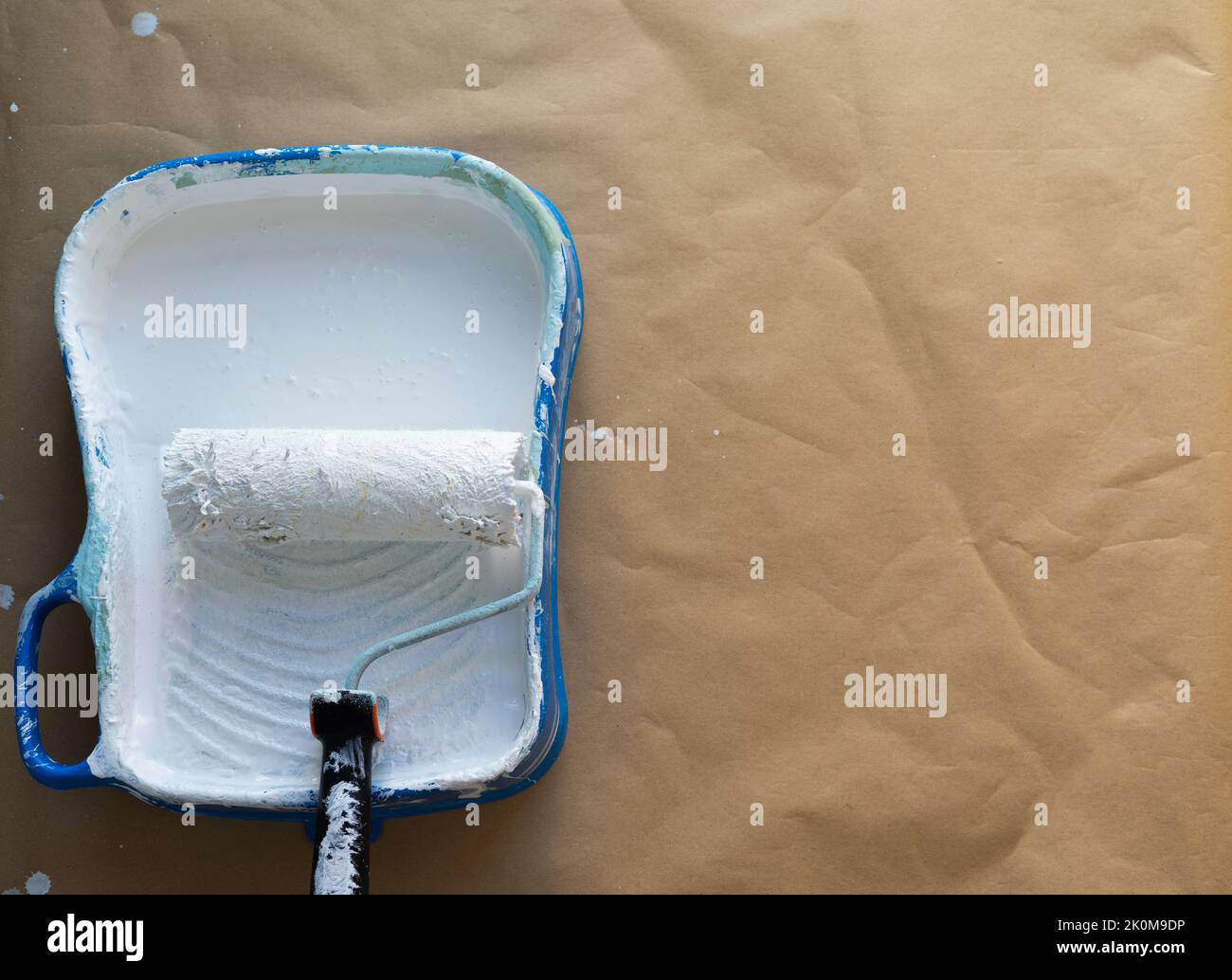 Painter's tools. Paint roller and paint tray. Copy space. Paper ...