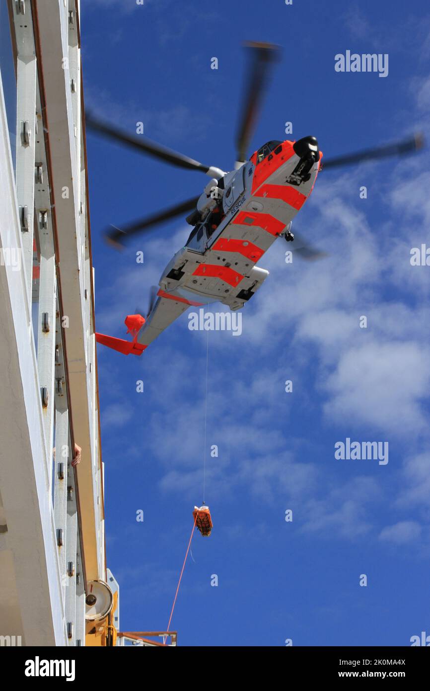 Emergency Marine evacuation by helicopter from a cruise ship in the ...