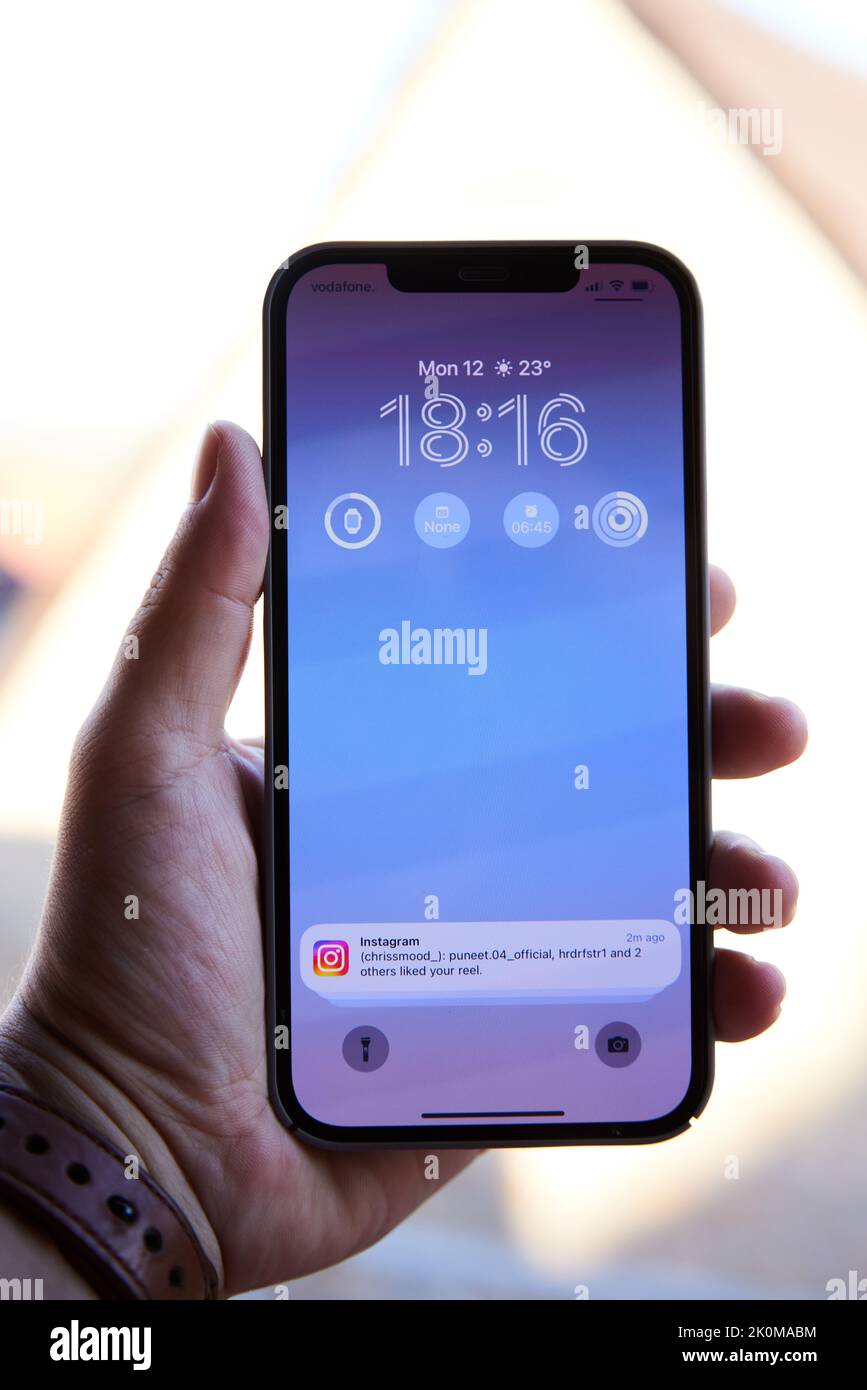 Apple iPhone 12 Pro Max in the hand with ios 16 and instagram ...