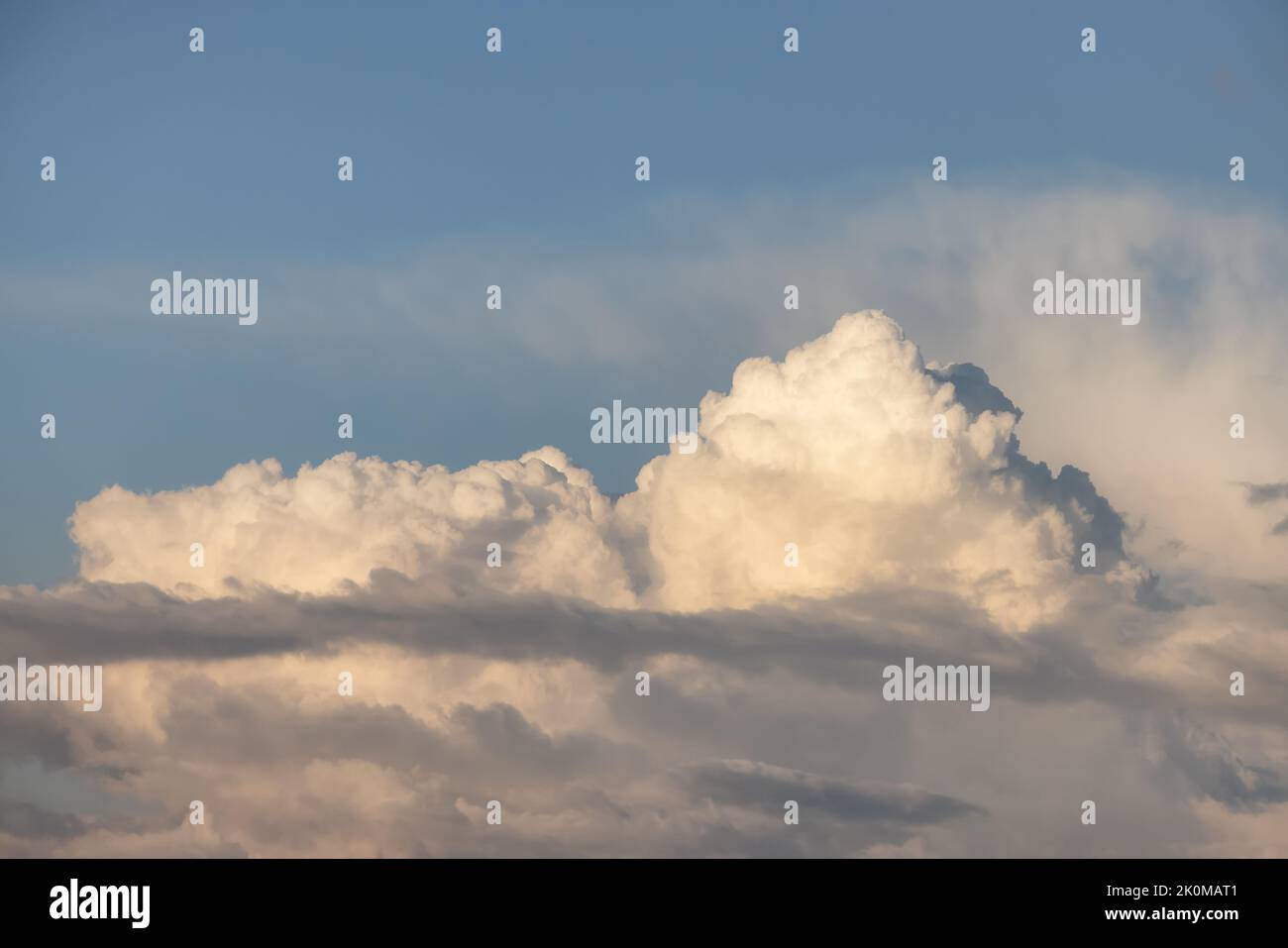 Puff Clouds in the Sky during sunset. Zoom in Stock Photo - Alamy