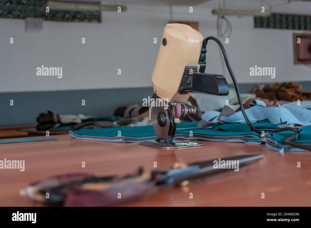 Disc cutting knife for cutting fabric in the sewing workshop Stock ...