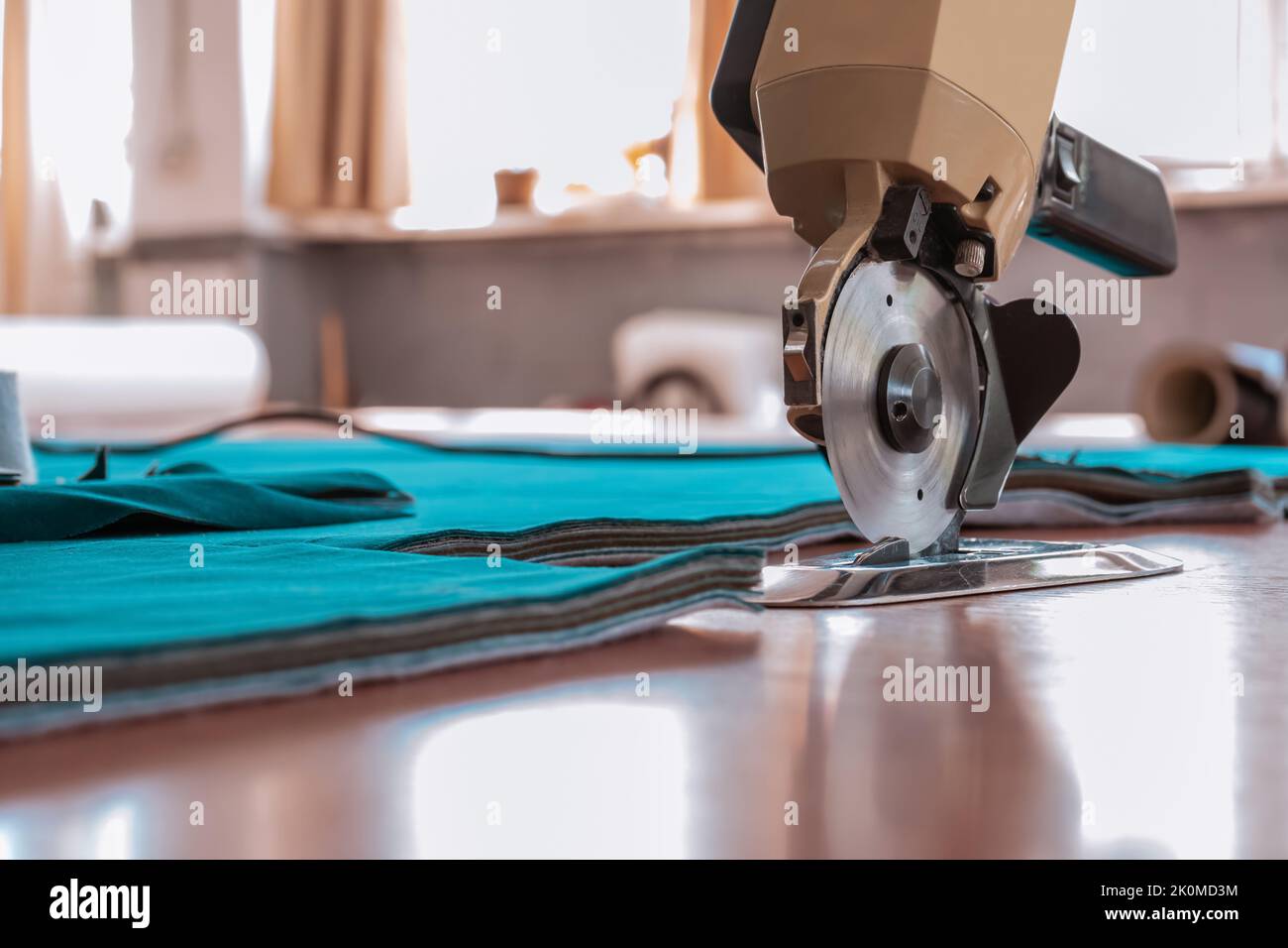Disc cutting knife for cutting fabric in the sewing workshop Stock ...