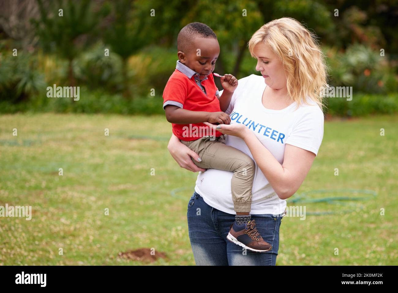Nothing good you do is ever wasted. a female volunteer carrying a ...