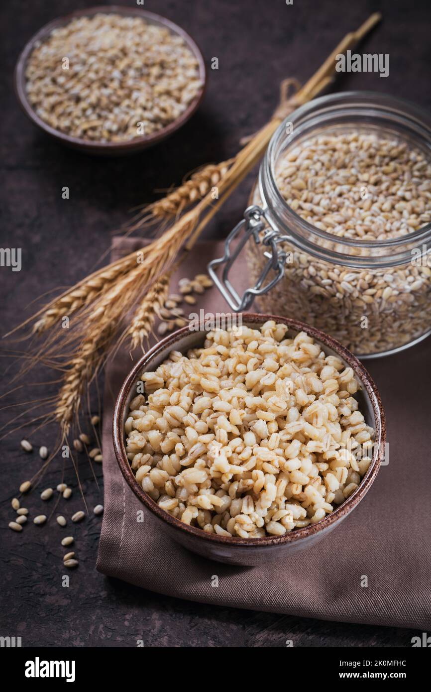 Bowl of cooked peeled barley grains porridge Stock Photo - Alamy