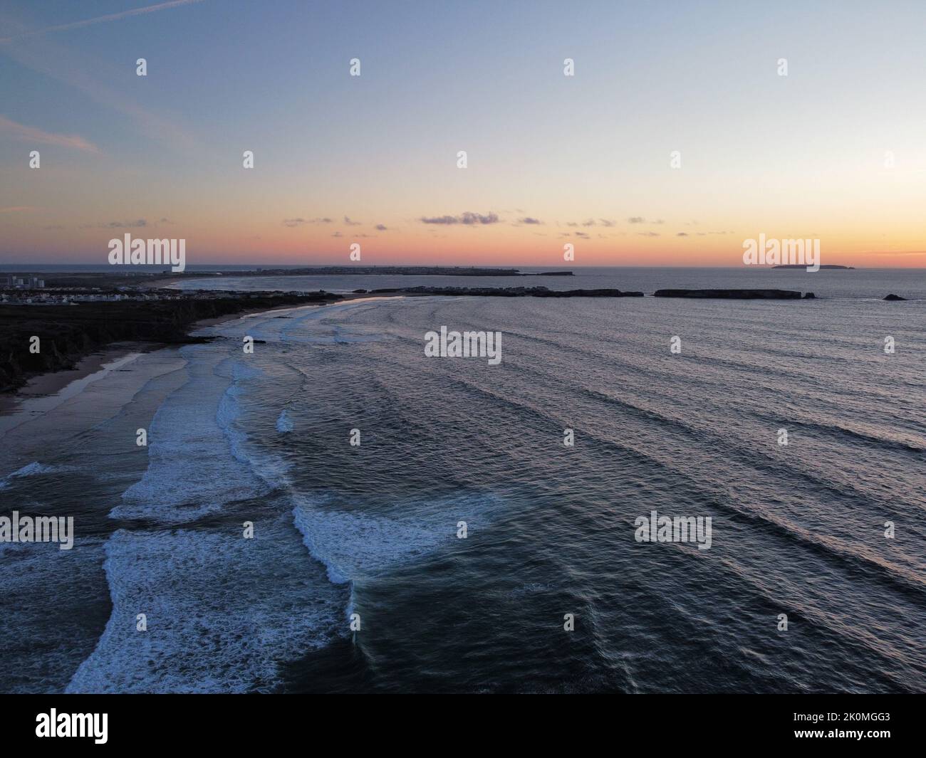 Aerial view of a wavy sea at sunset Stock Photo - Alamy
