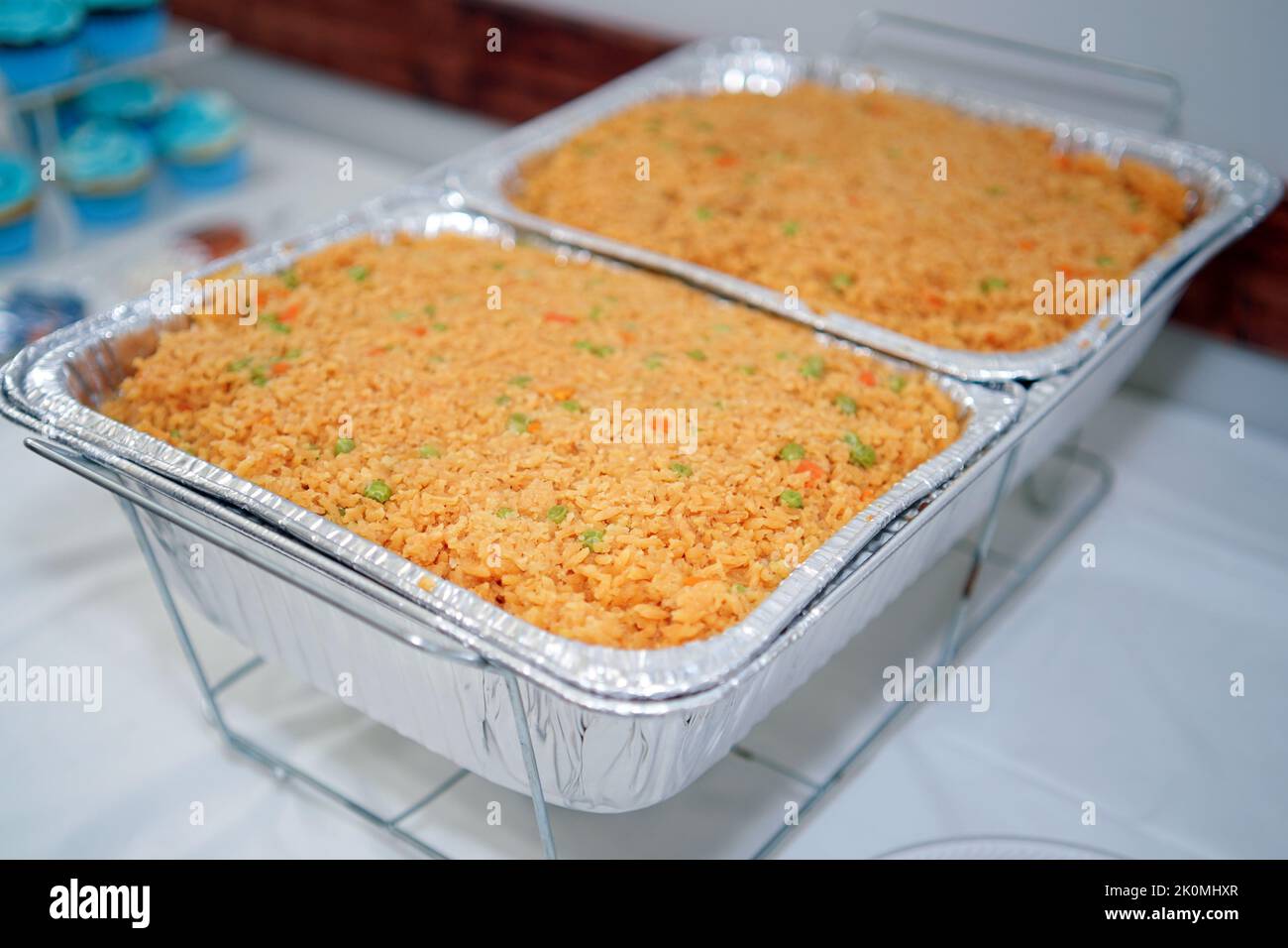 A banquet party food on a hot plate container Stock Photo - Alamy