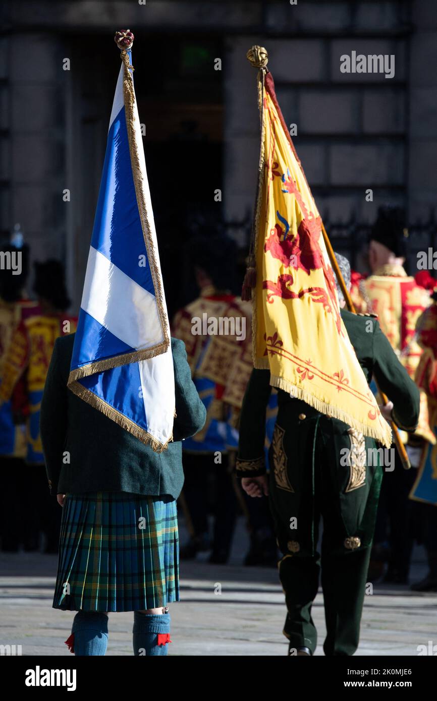 The Lion Rampant and Saltire flags are carried into St. Giles Cathedral ...