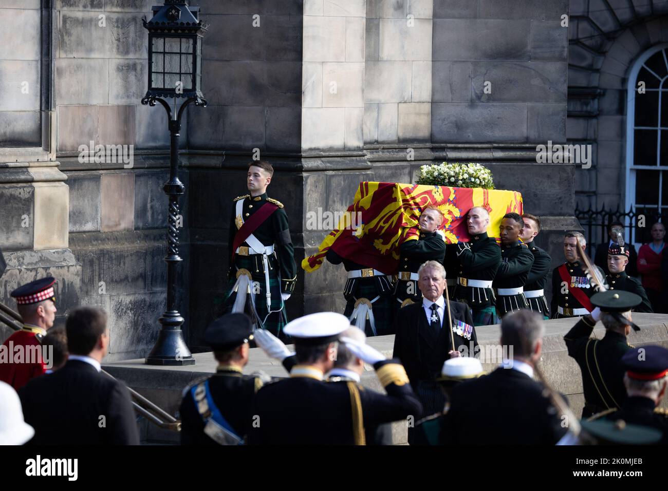 Pallbearers carry the coffin of Britain Queen Elizabeth, as the hearse ...