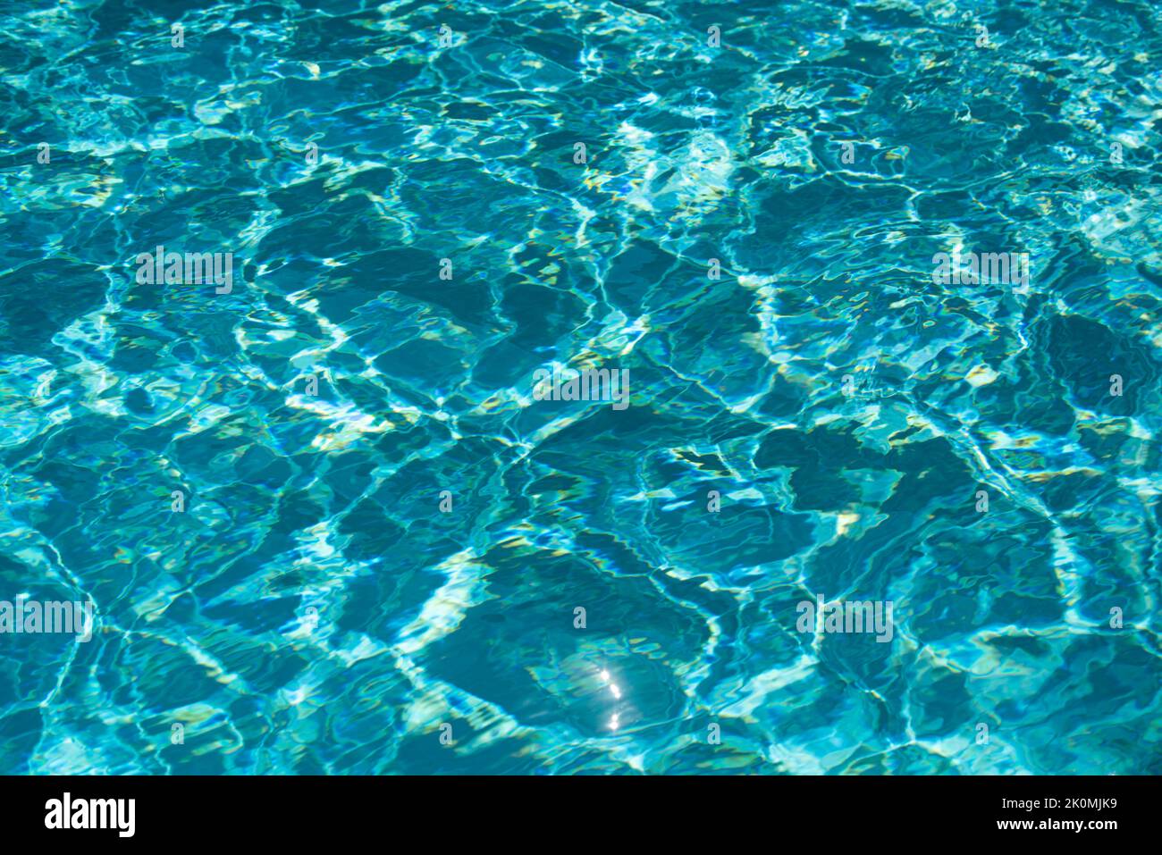 Water in swimming pool, background with high resolution. Wave abstract or rippled water texture ...