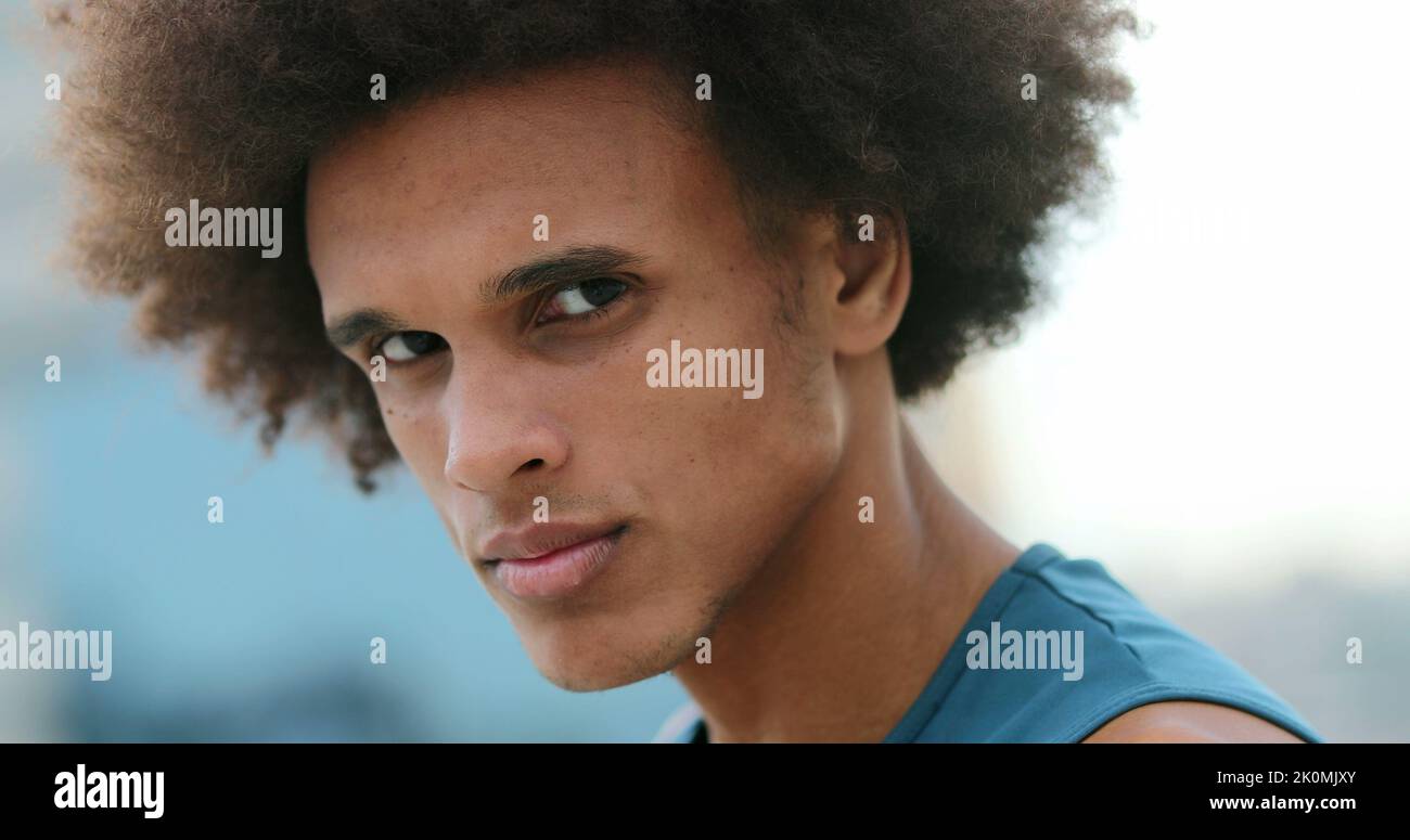 Serious handsome african mixed race man facing camera portrait Stock ...