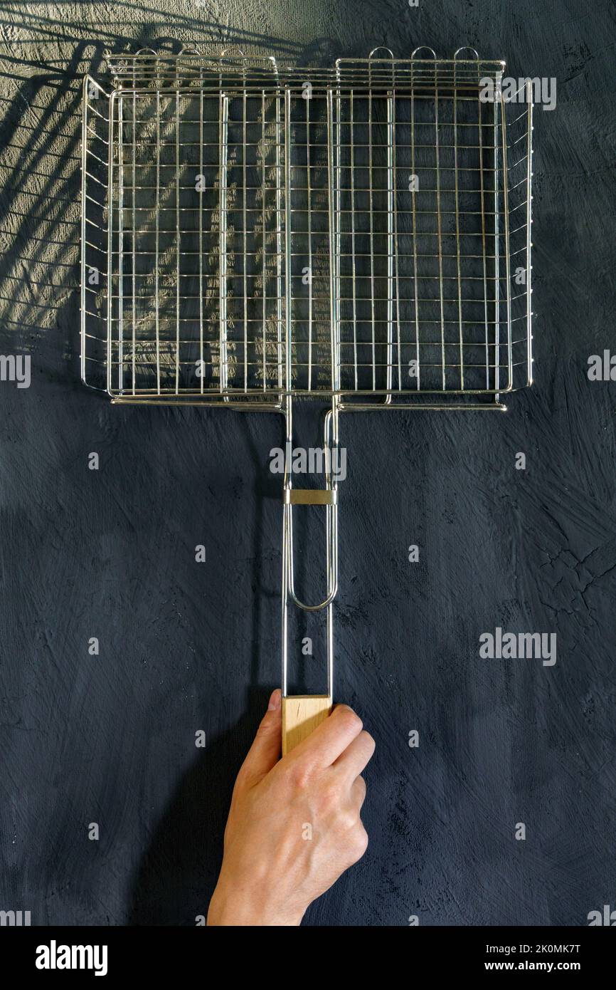 Barbecue grill. BBQ preparation set. Black background. Ready Grilling ...