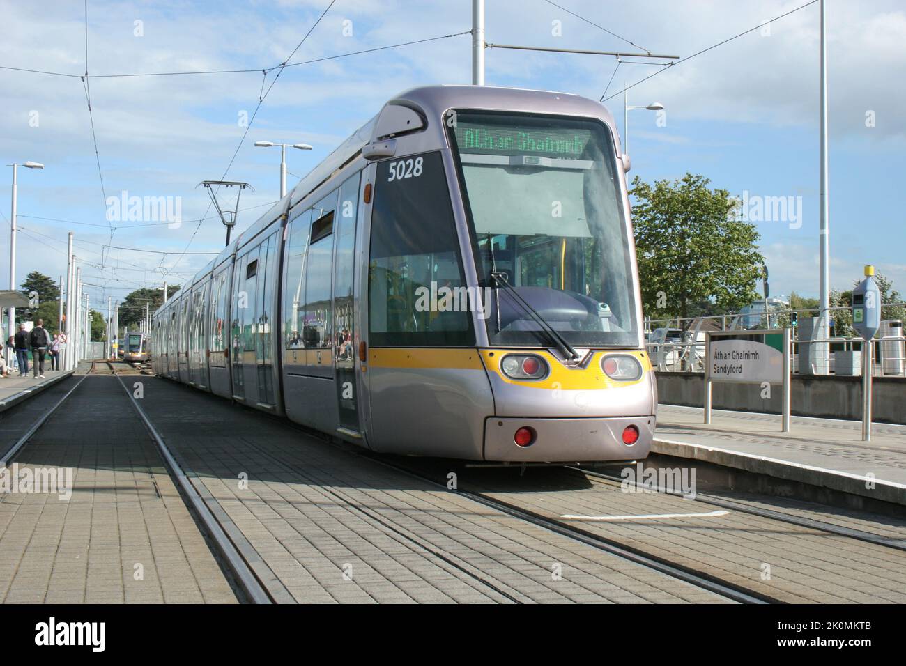 A gray train on a railroad Stock Photo - Alamy