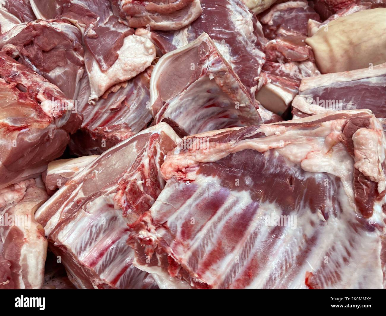 Meat texture chunks arranged in a row in a large in the meat market ...