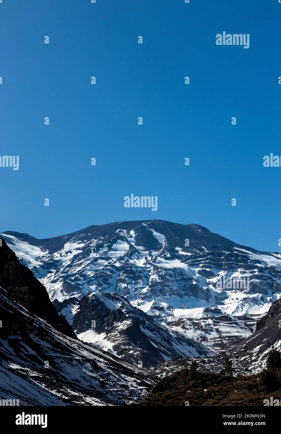 A vertical of a beautiful snowy mountain Stock Photo - Alamy