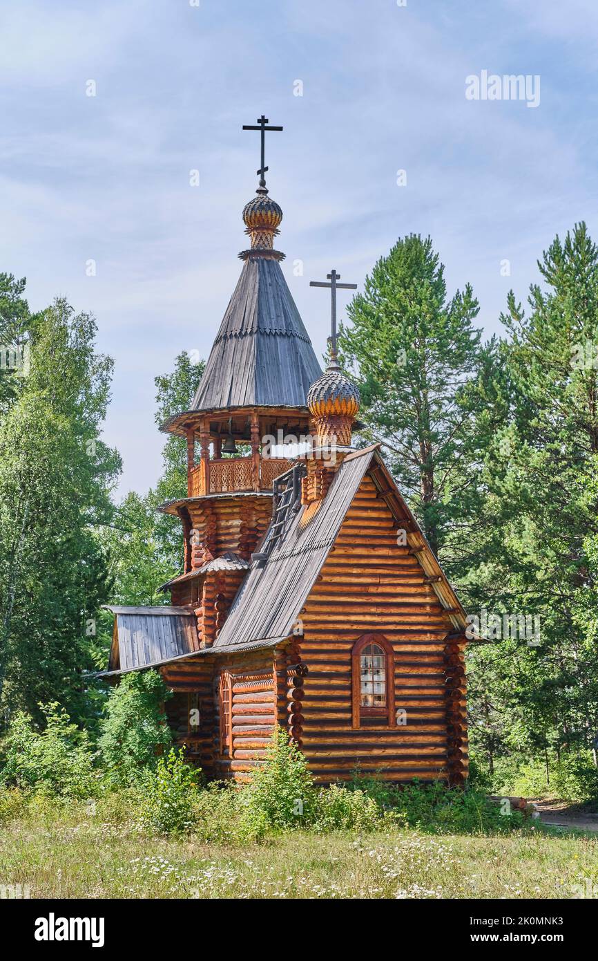 Modern log hipped-roof church in style of Russian wooden architecture ...