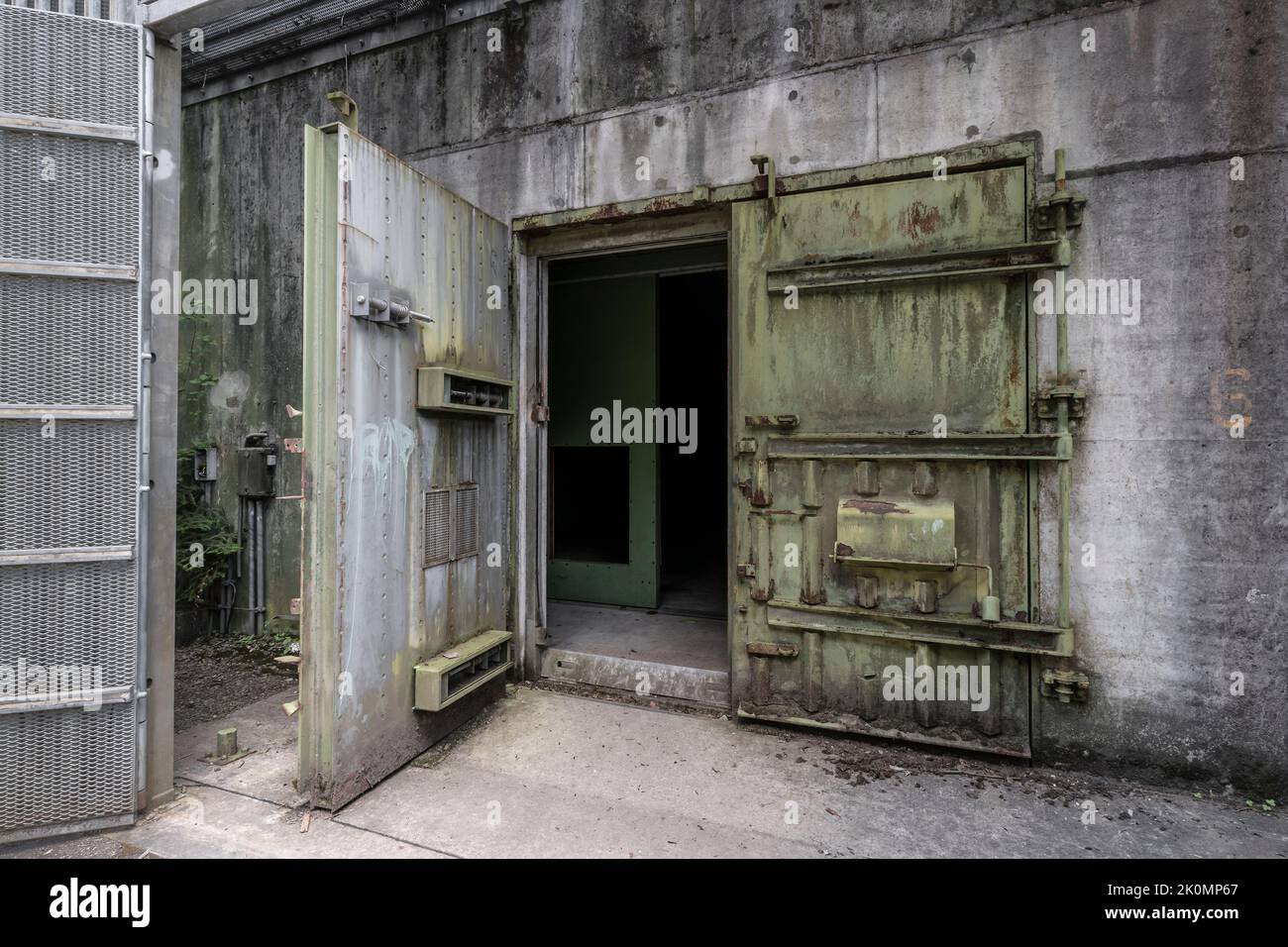 door of a military storage bunker building Stock Photo - Alamy