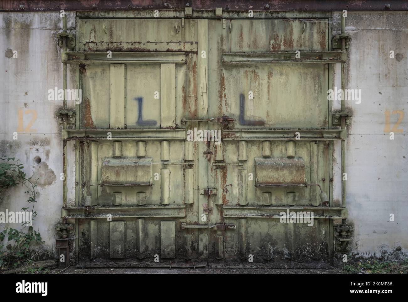door of a military storage bunker building Stock Photo - Alamy
