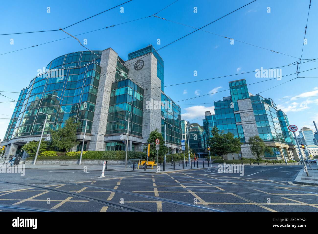 A low-angle shot of the facade of IFSC House and the Touche House with ...