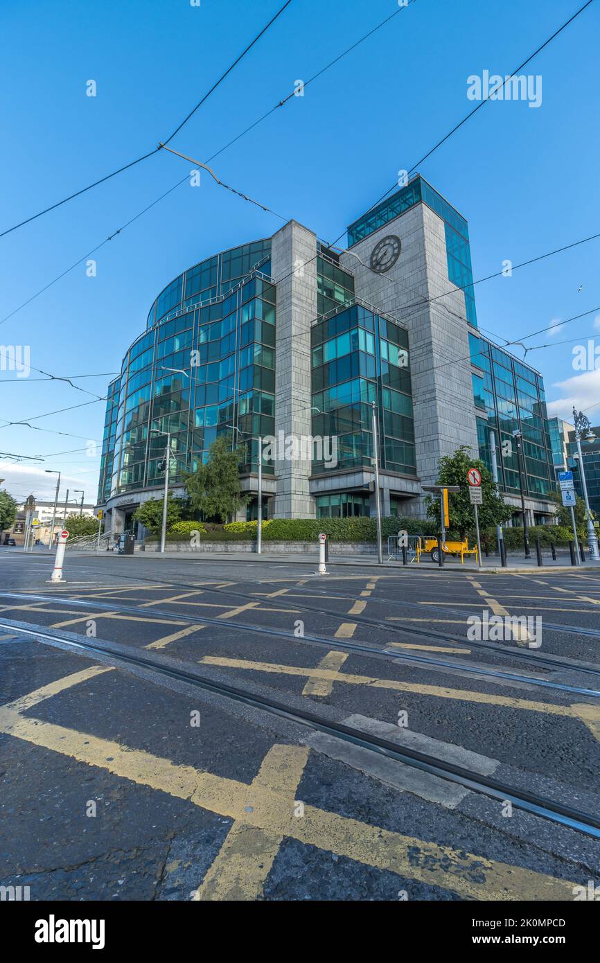 A vertical shot of the facade of the International Financial Services ...