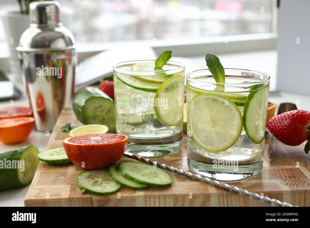 Preparation of chilled lime with cucumber punch homemade cocktail ...